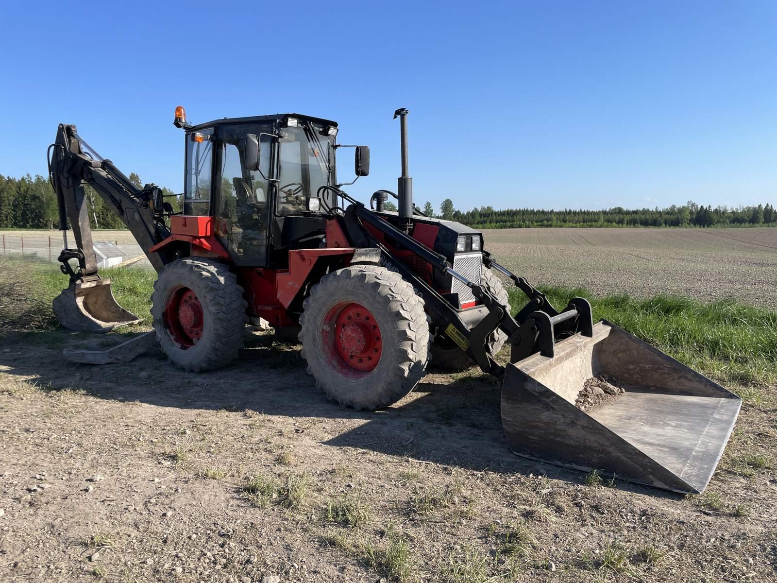 Netauktion - Traktorgrävare Huddig 760